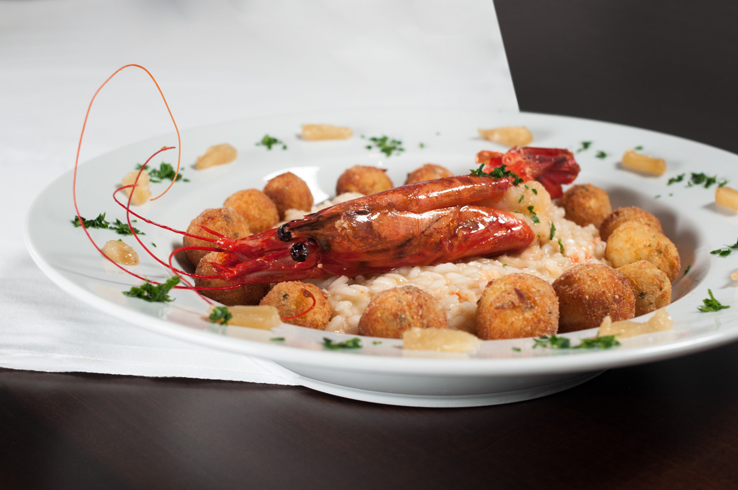 Risotto di pesce con polpettine di baccalà e Aglio di Voghiera DOP ...